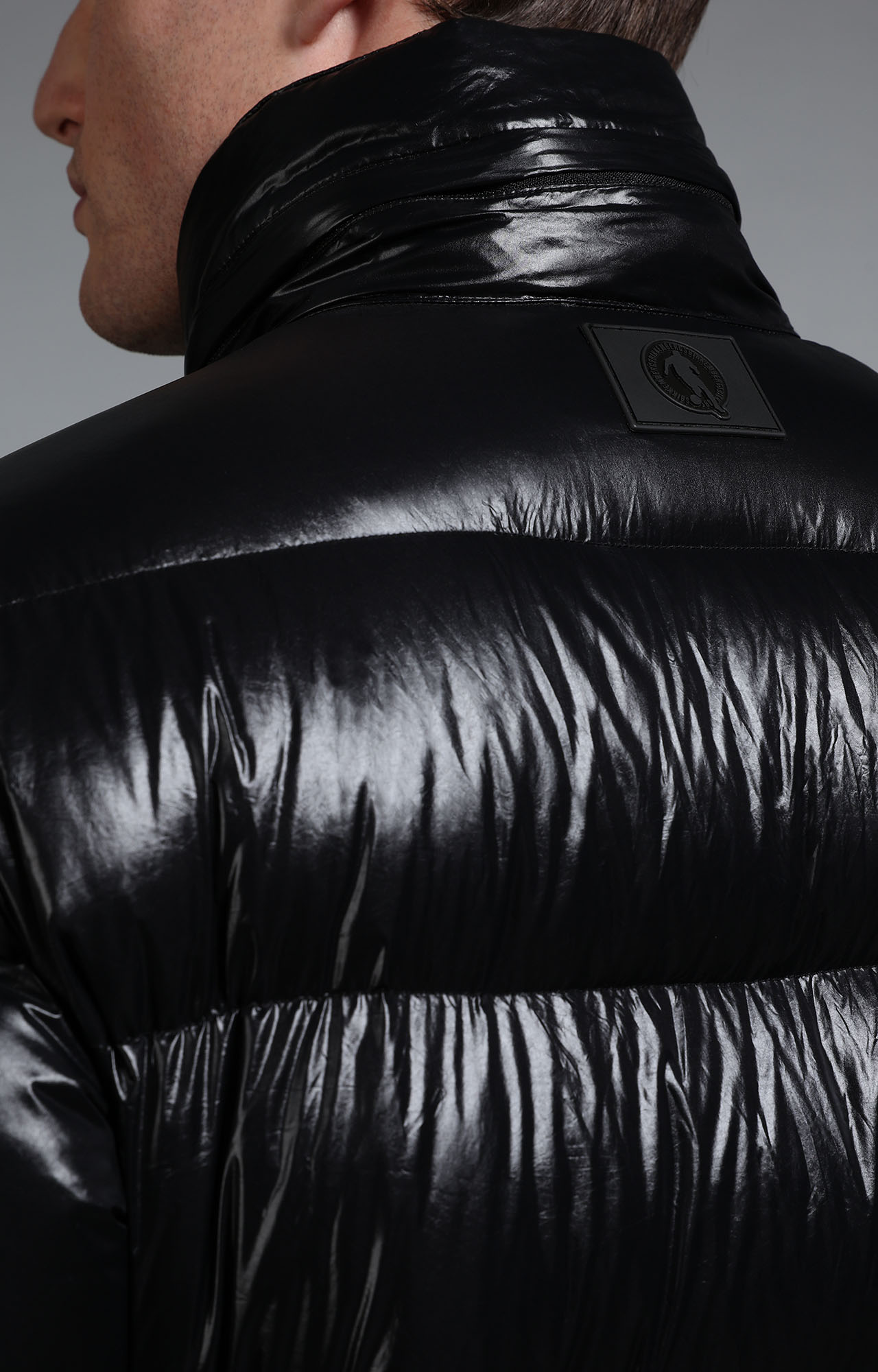 Black Men's shiny black down jacket | Bikkembergs