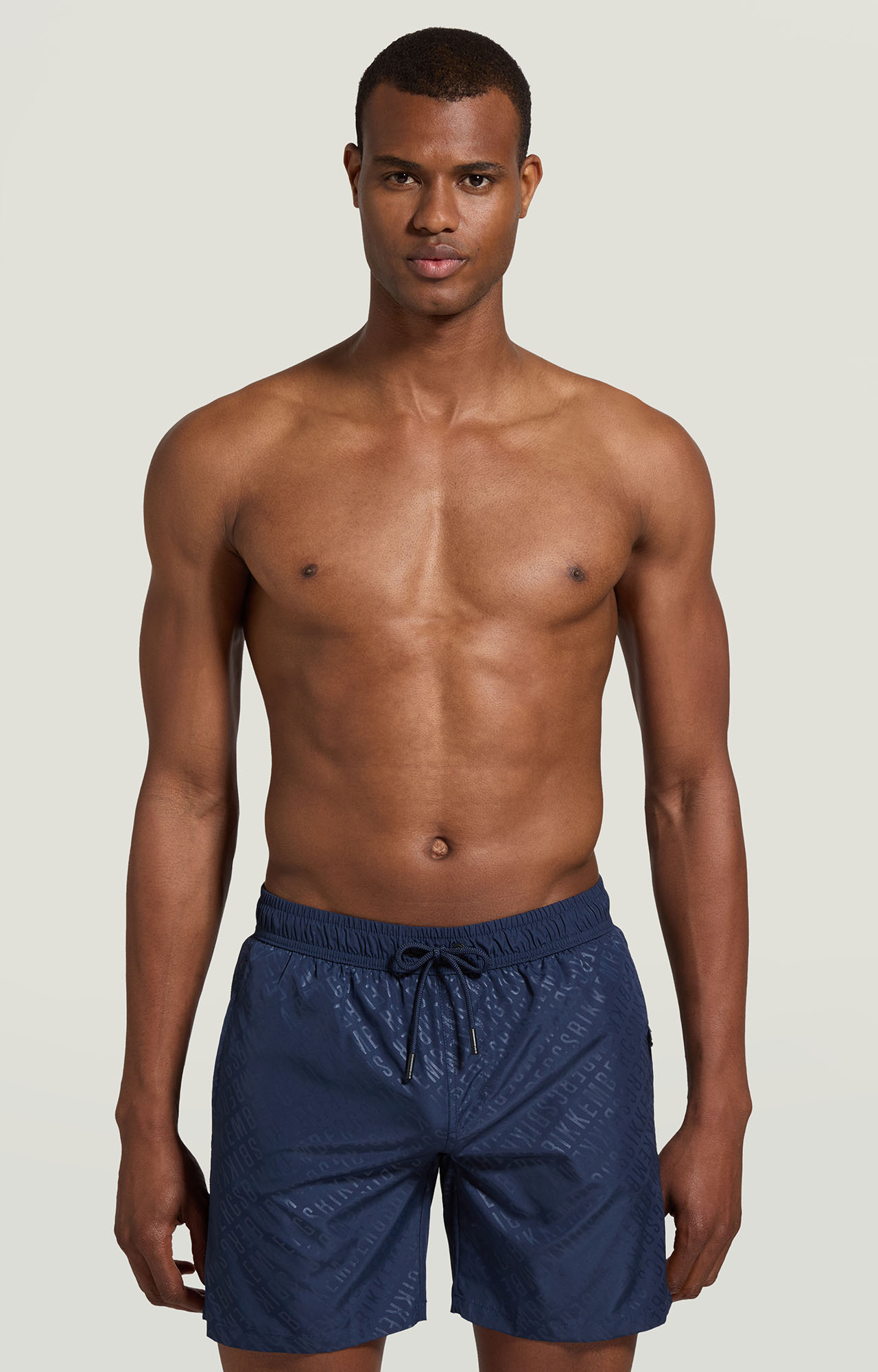 Men's Blue all-over swim shorts | Bikkembergs