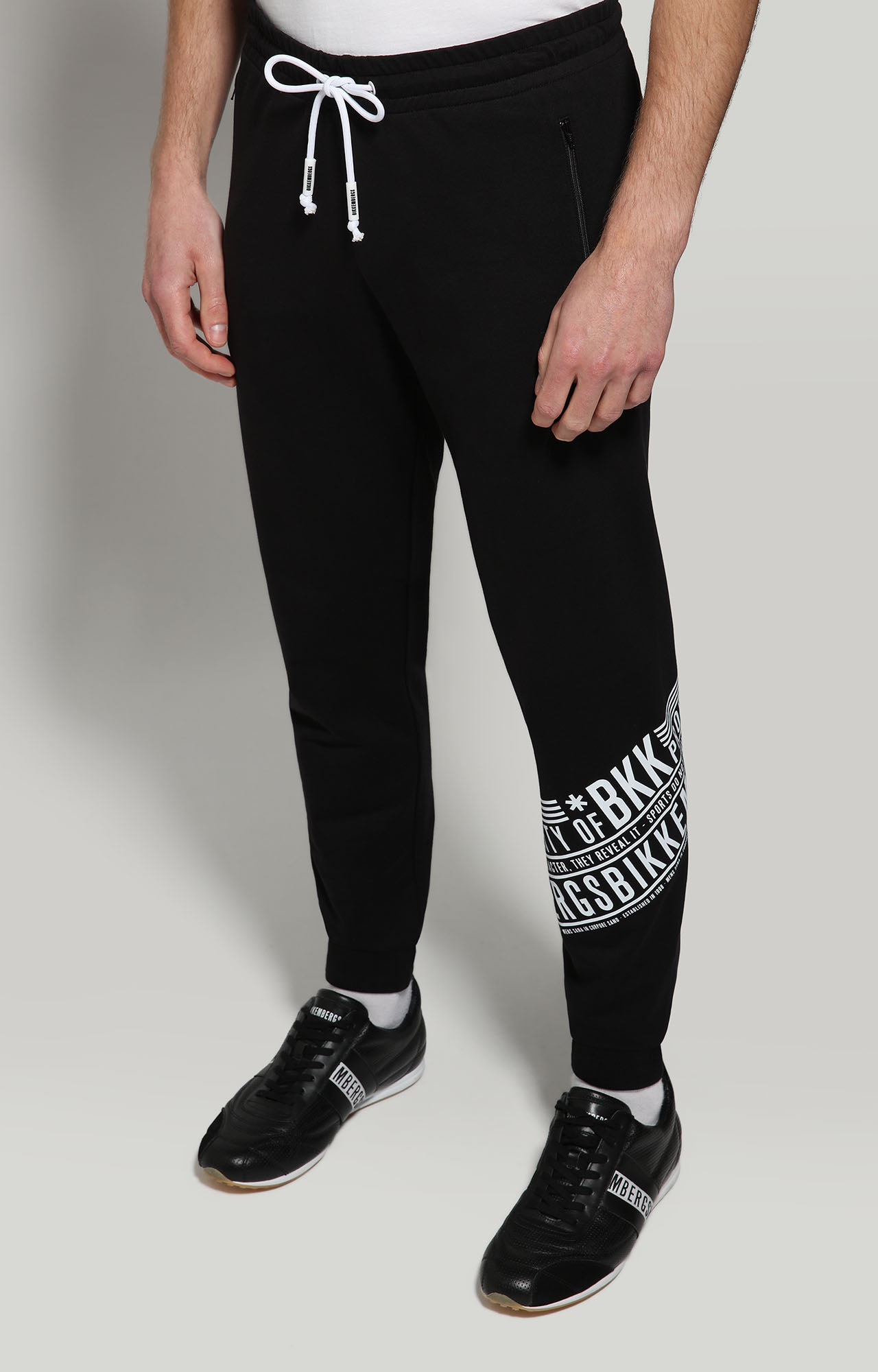 Men's Black sweatpants with diagonal print | Bikkembergs